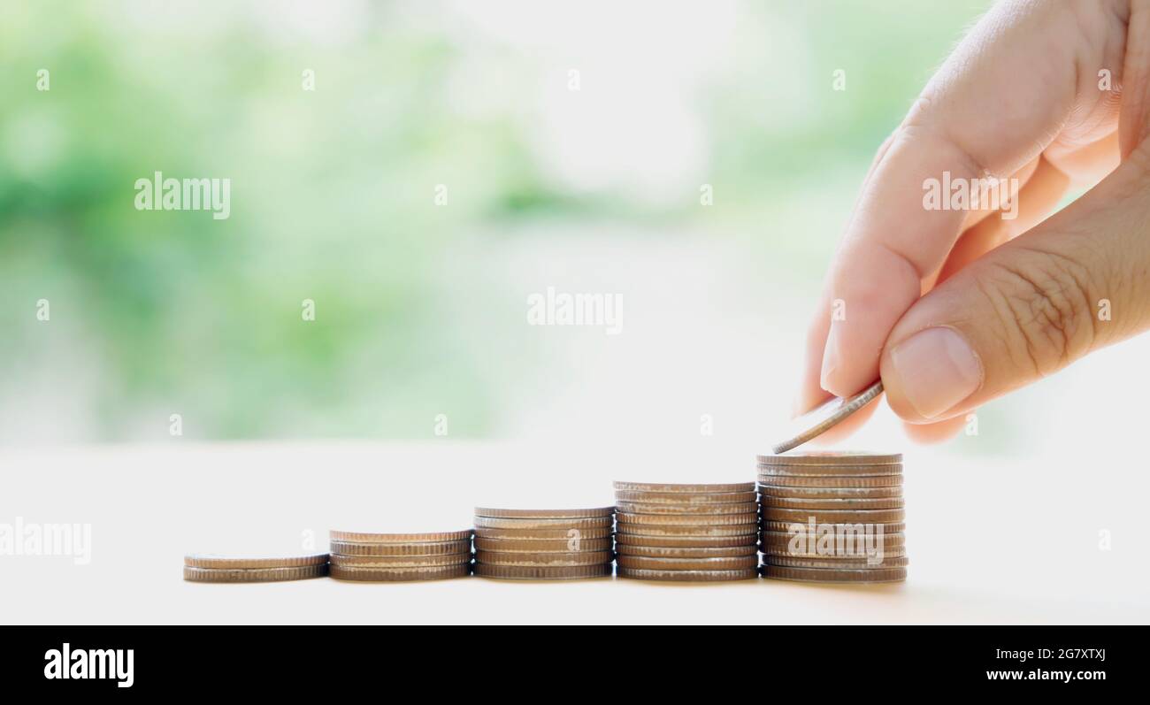 Female hand with coins hi-res stock photography and images - Alamy