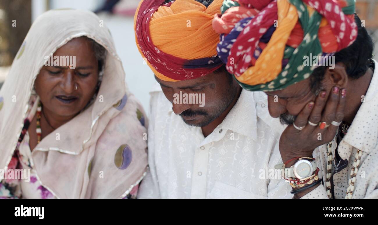 Indian female and male in traditional costume attire from the state of ...