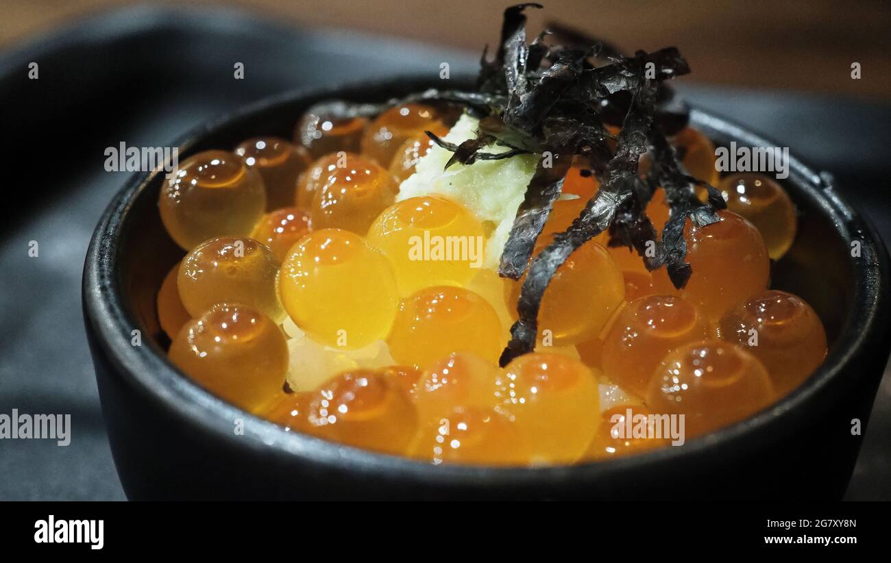 Ikura roe. Salmon Ikura Roe Served with rice and top with japanese ...