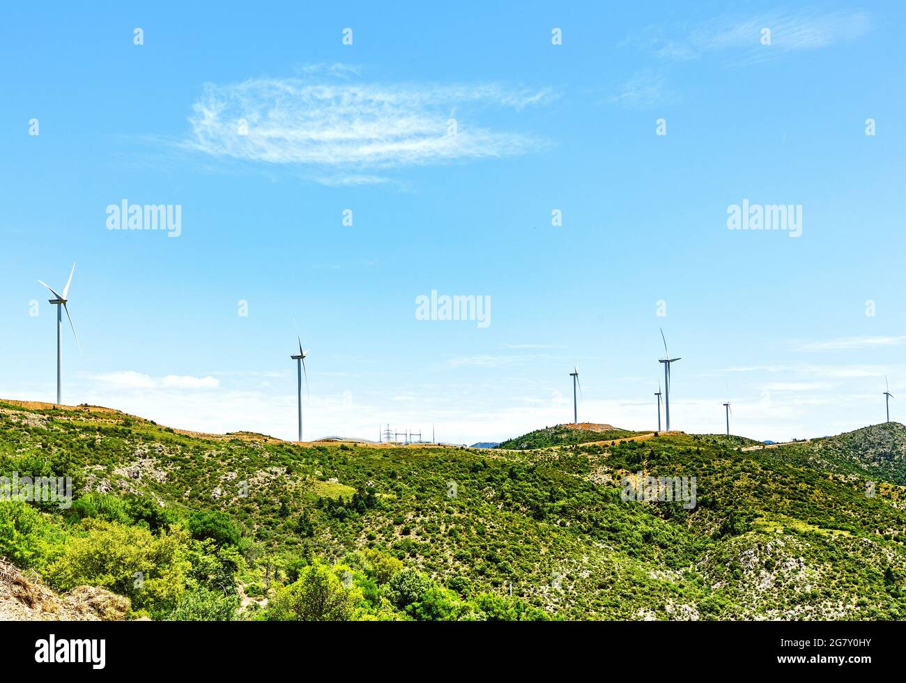 Wind power plant on a hill, sunny day. Greece Stock Photo - Alamy