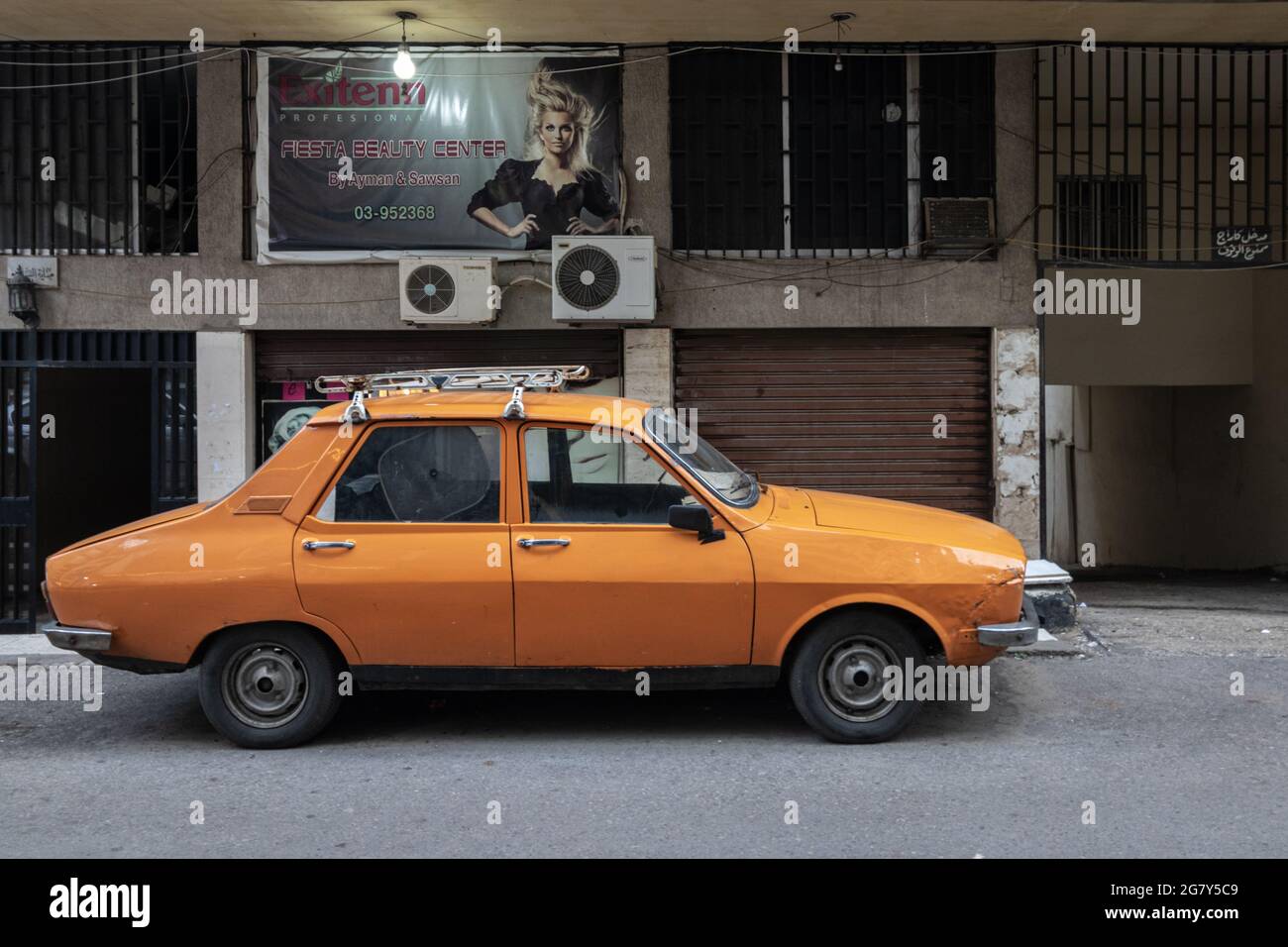 BEIRUT, LEBANON - Mar 31, 2019: A vintage orange Renault parked in ...