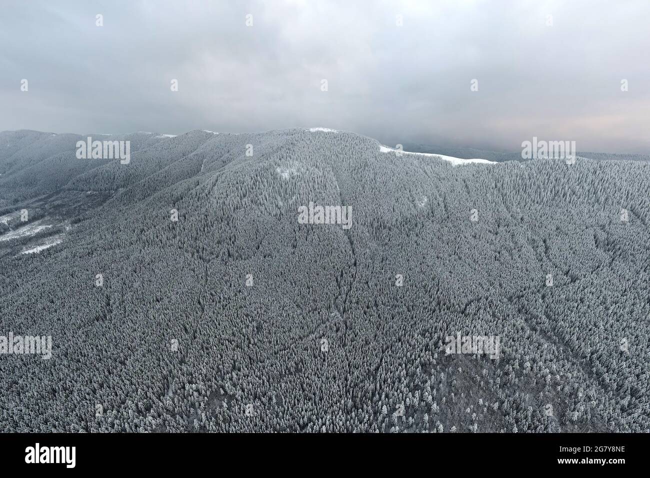 Aerial view of winter landscape with mountain hills covered with ...