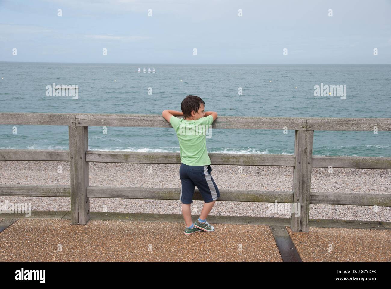 Child contemplating the sea in Etretat Normandy. France Stock Photo - Alamy