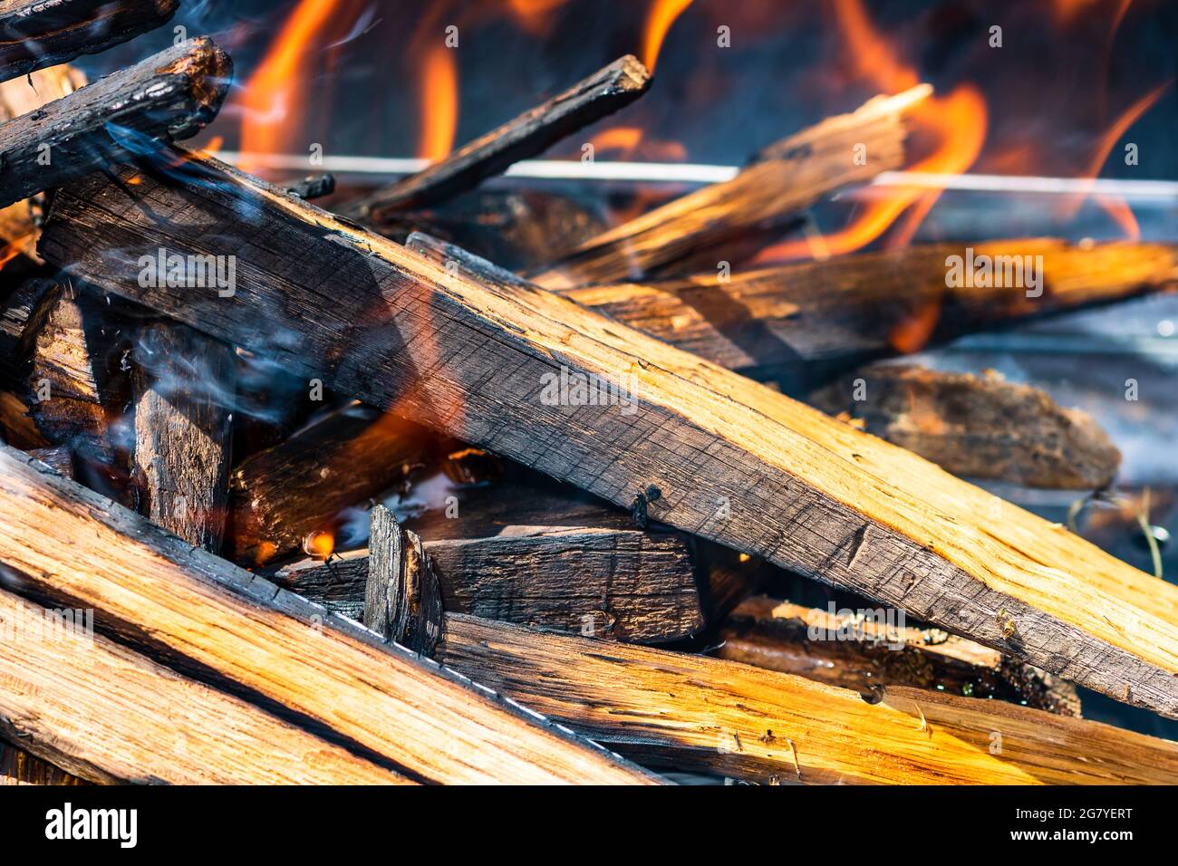 Barbecue grill pit with glowing and flaming hot open fire with red ...