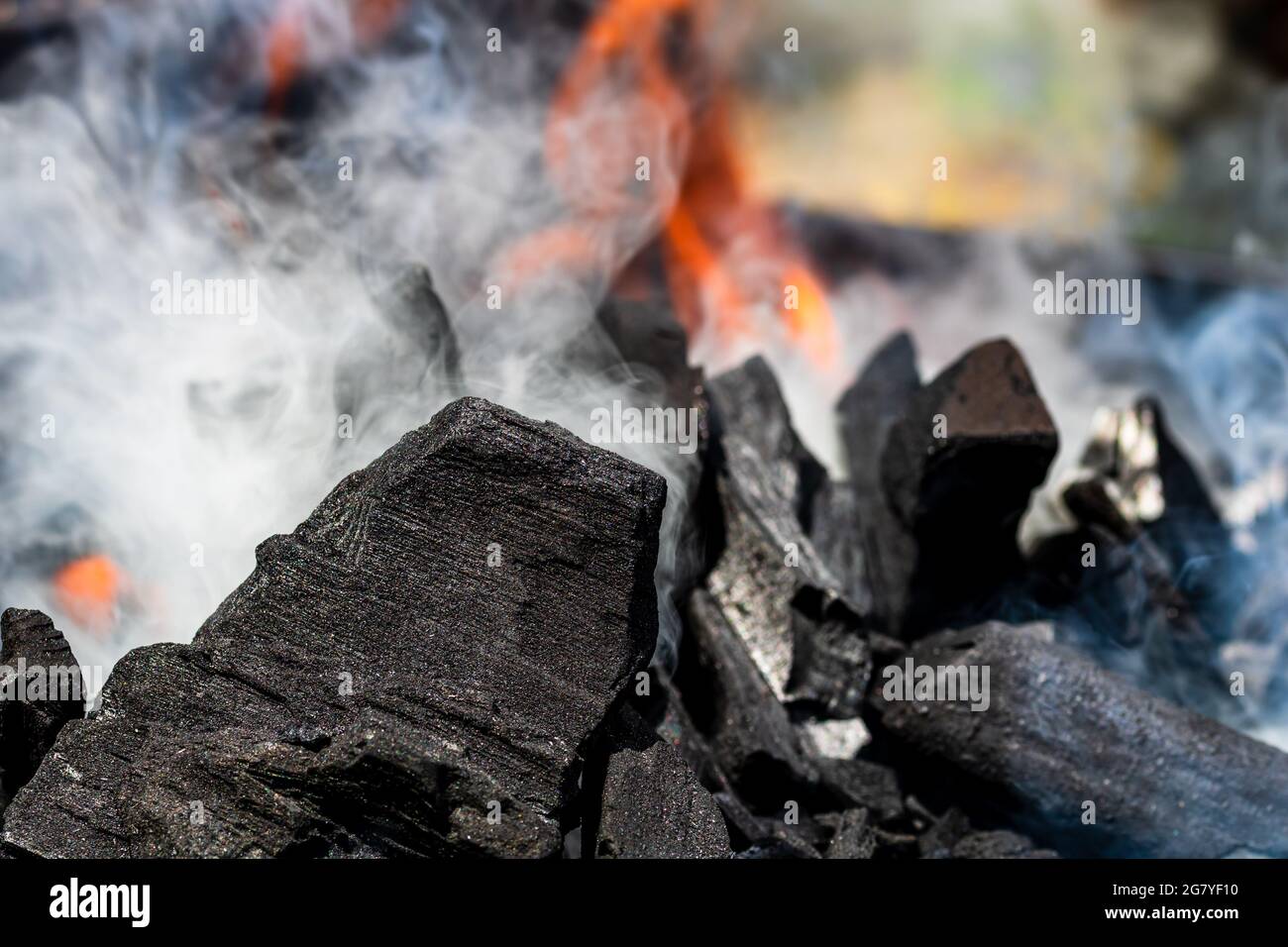 Barbecue grill pit with glowing and flaming hot open fire with red ...