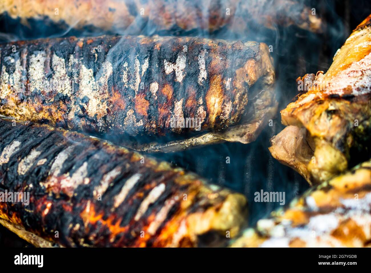 Grilled fish on charcoal grill. Fresh fish barbecue Stock Photo - Alamy