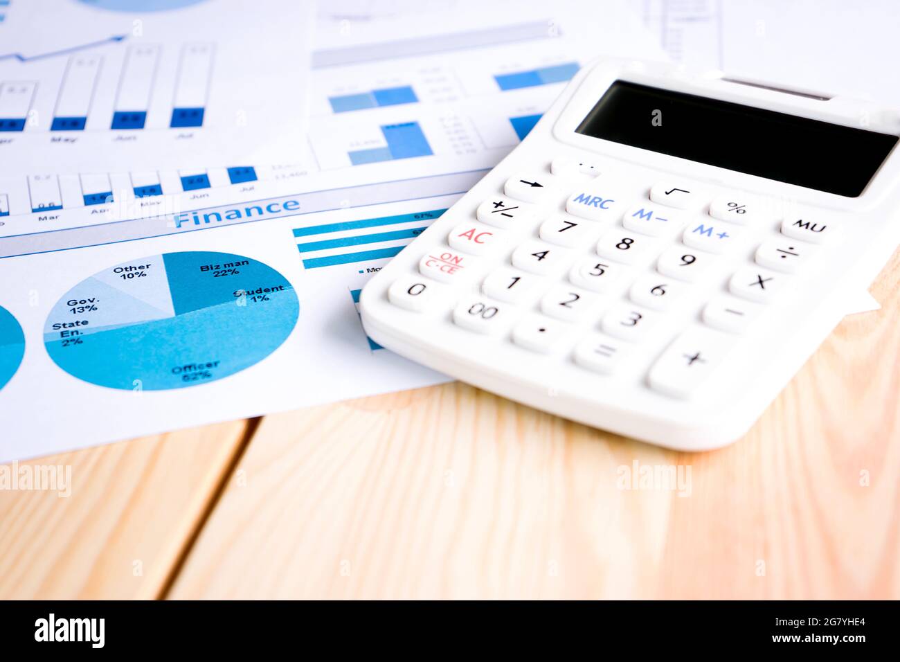 Calculator and charts Stock Photo - Alamy