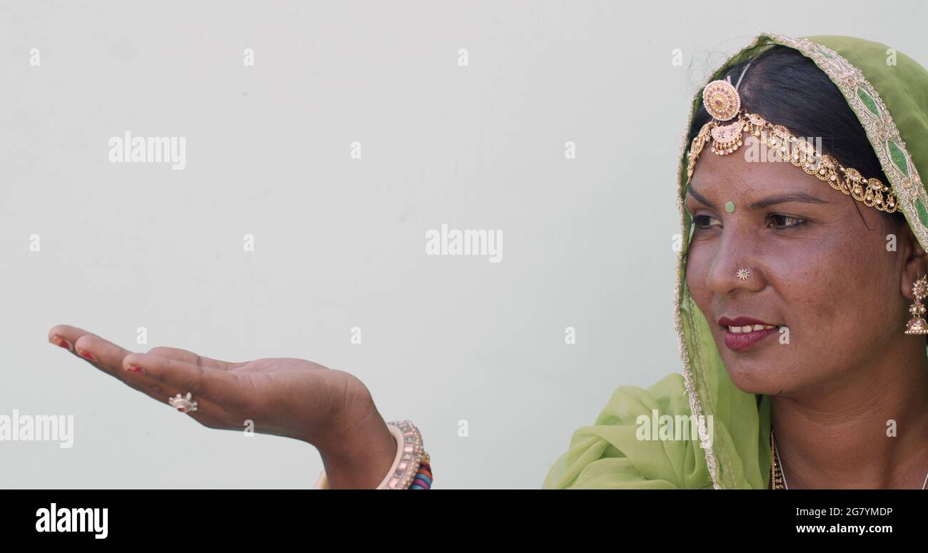 India woman holding fabric hi-res stock photography and images - Alamy