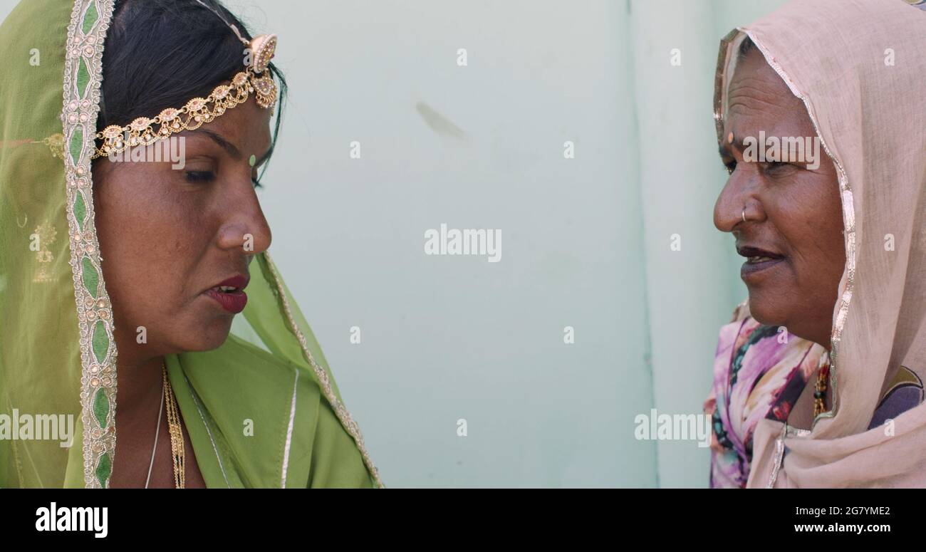 Closeup of two Indian women having a conversation Stock Photo - Alamy