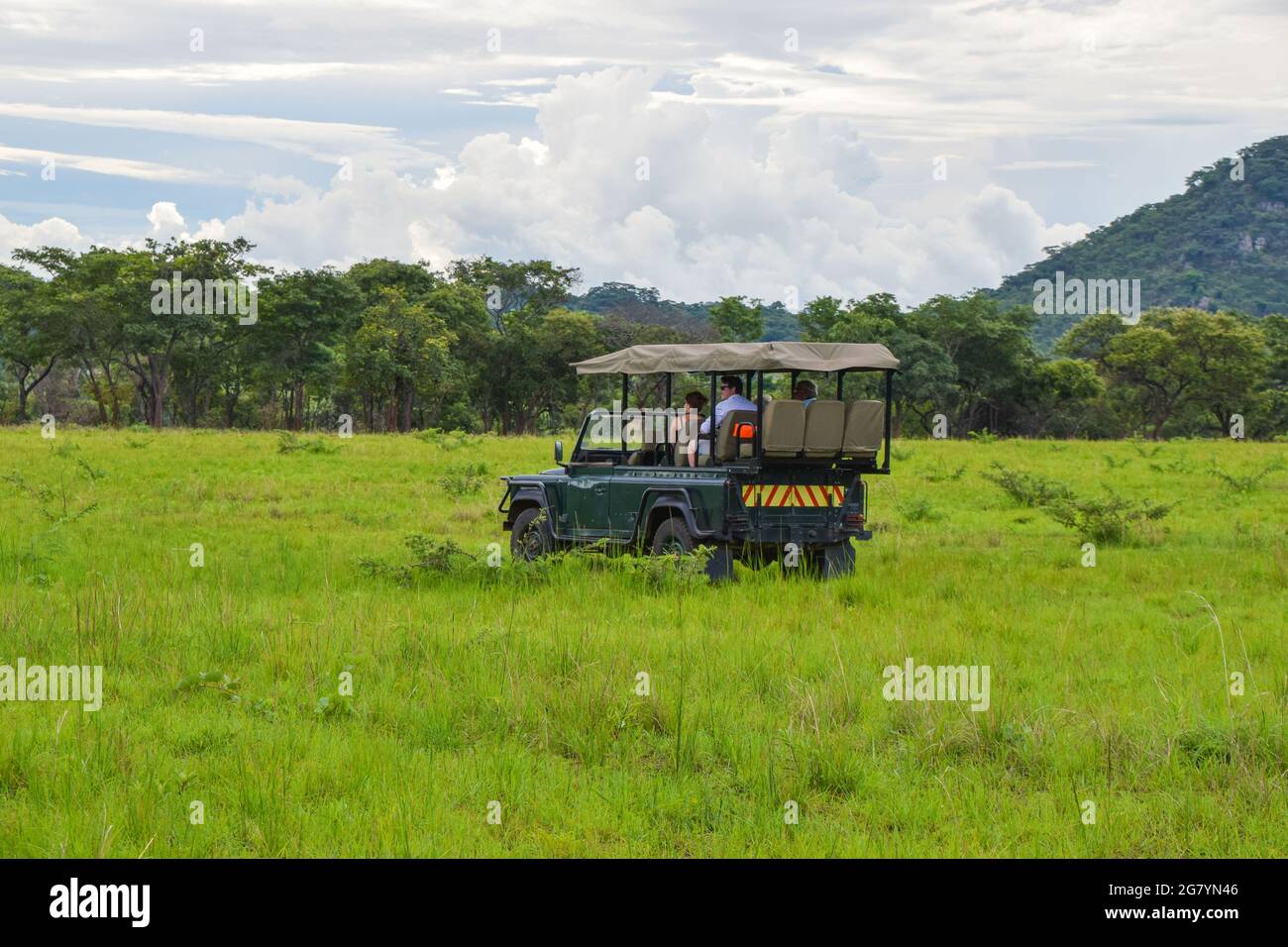 Scenic African landscape with a safari vehicle in Zimbabwe Stock Photo ...