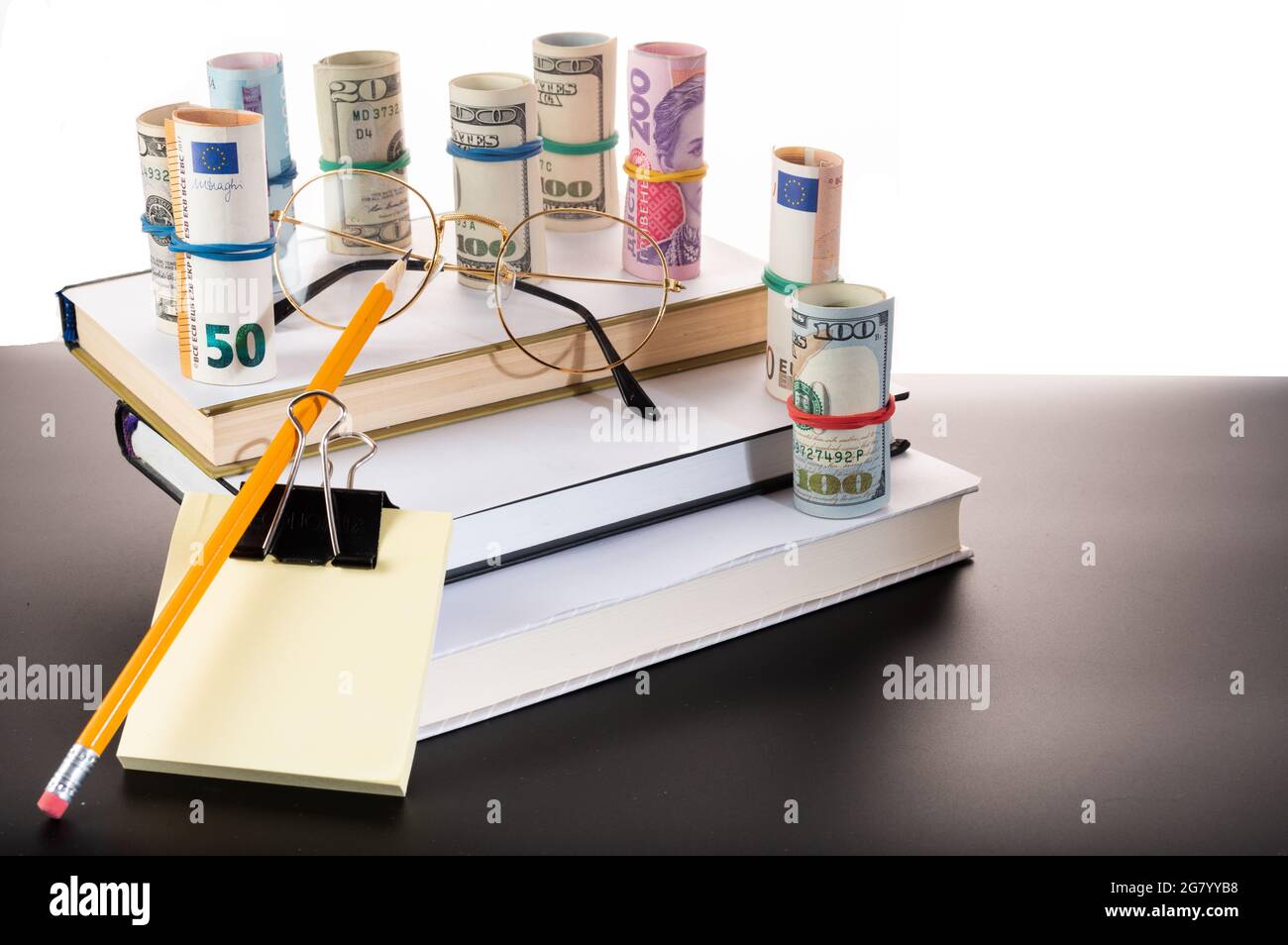 Money for education. Money for studies. Money and school subjects ...