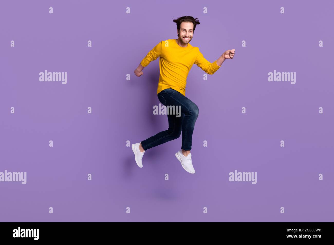 Full length body size photo smiling man jumping up running fast ...
