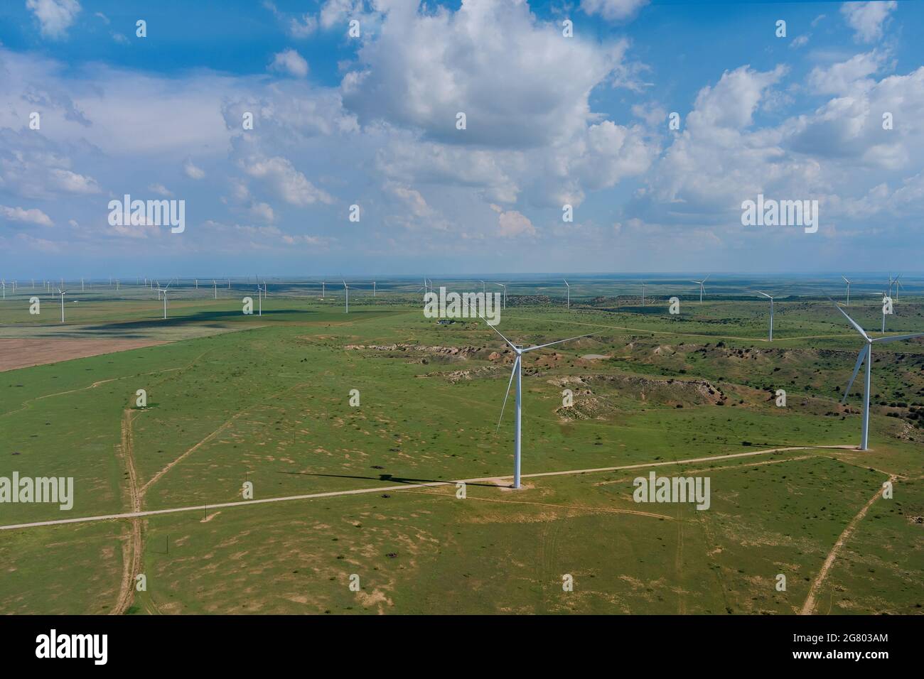 Panoramic view Texas landscape hills with wind turbines generator farm ...