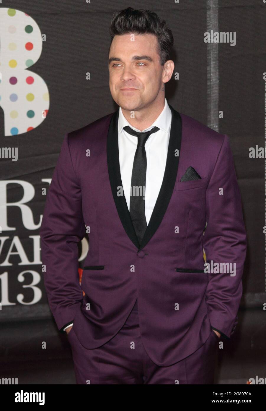 London, UK. Robbie Williams at the 2013 Brit Awards held at the O2 ...