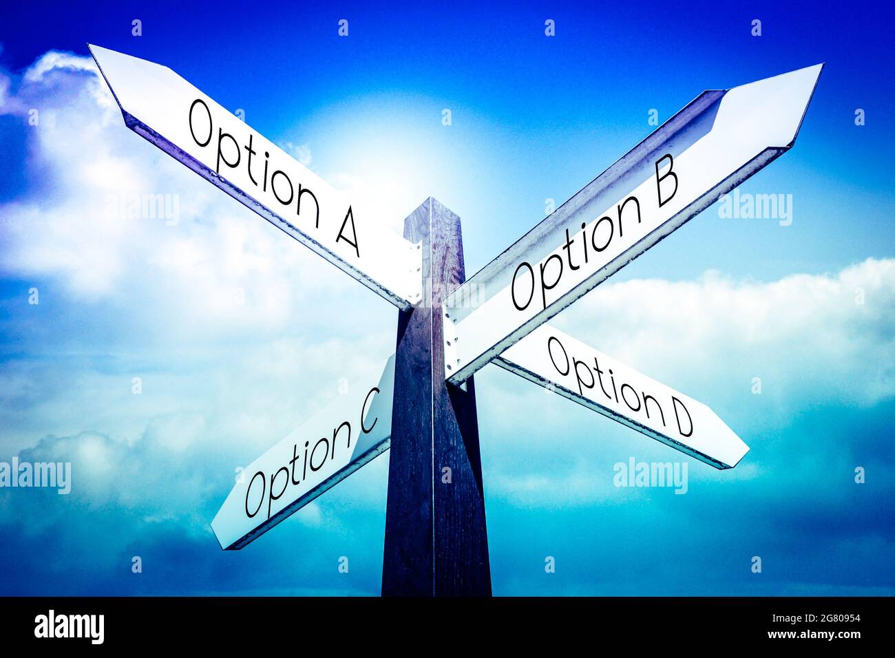 Options A, B, C, D concept - signpost with four arrows Stock Photo - Alamy