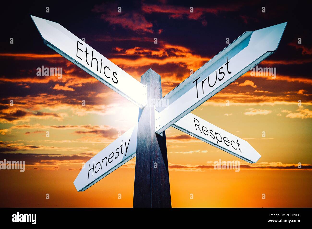 Ethics, trust, respect, honesty concept - signpost with four arrows ...