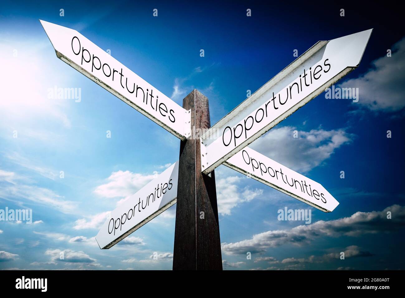 Sign post four arrows hi-res stock photography and images - Alamy