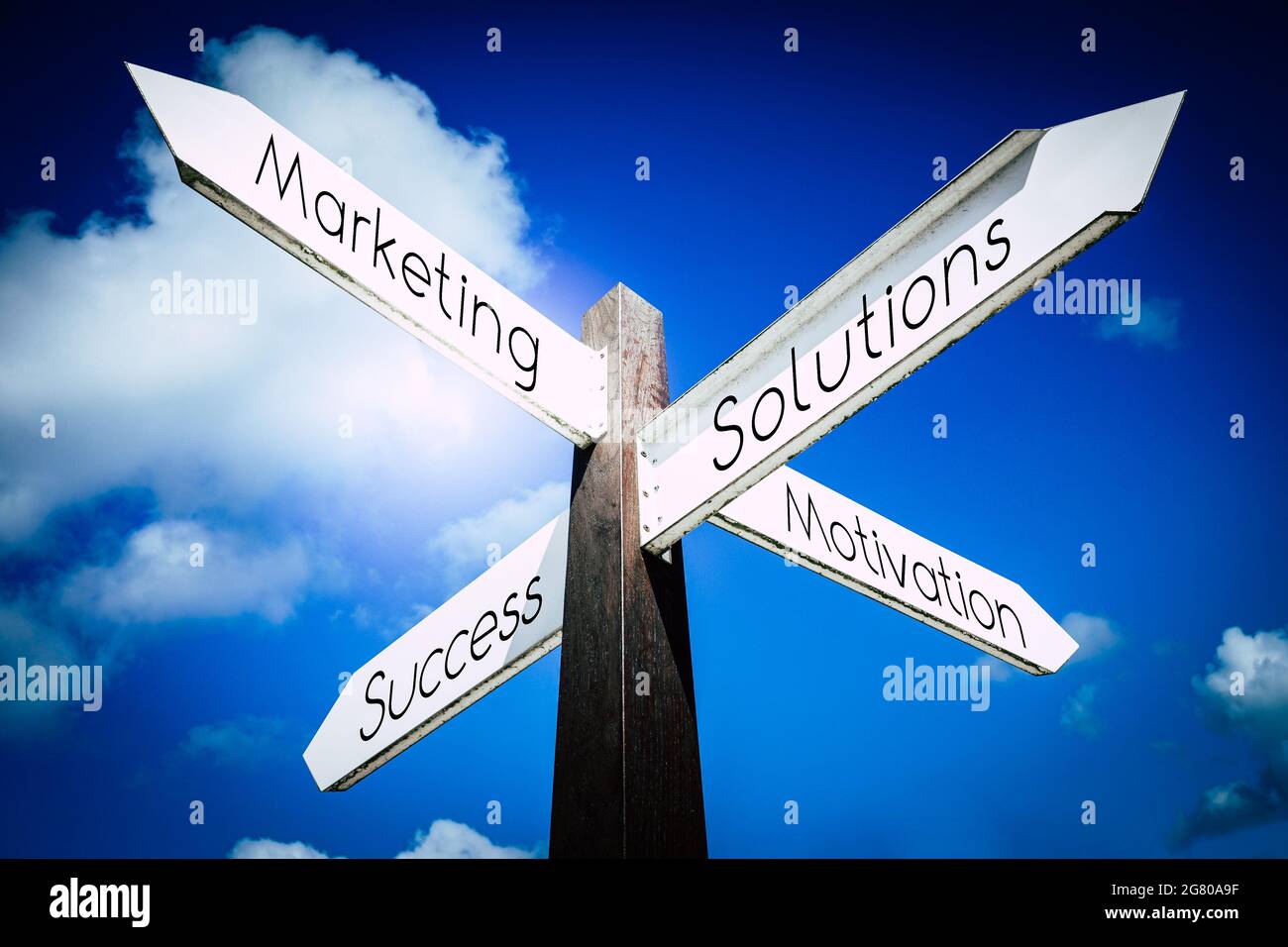 Marketing, solutions, success, motivation concept - signpost with four ...