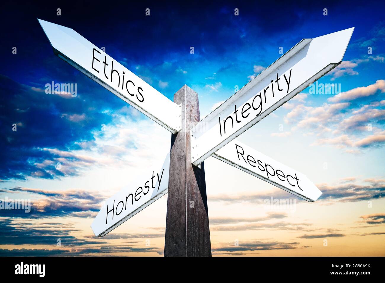 Ethics, integrity, honesty, respect concept - signpost with four arrows ...