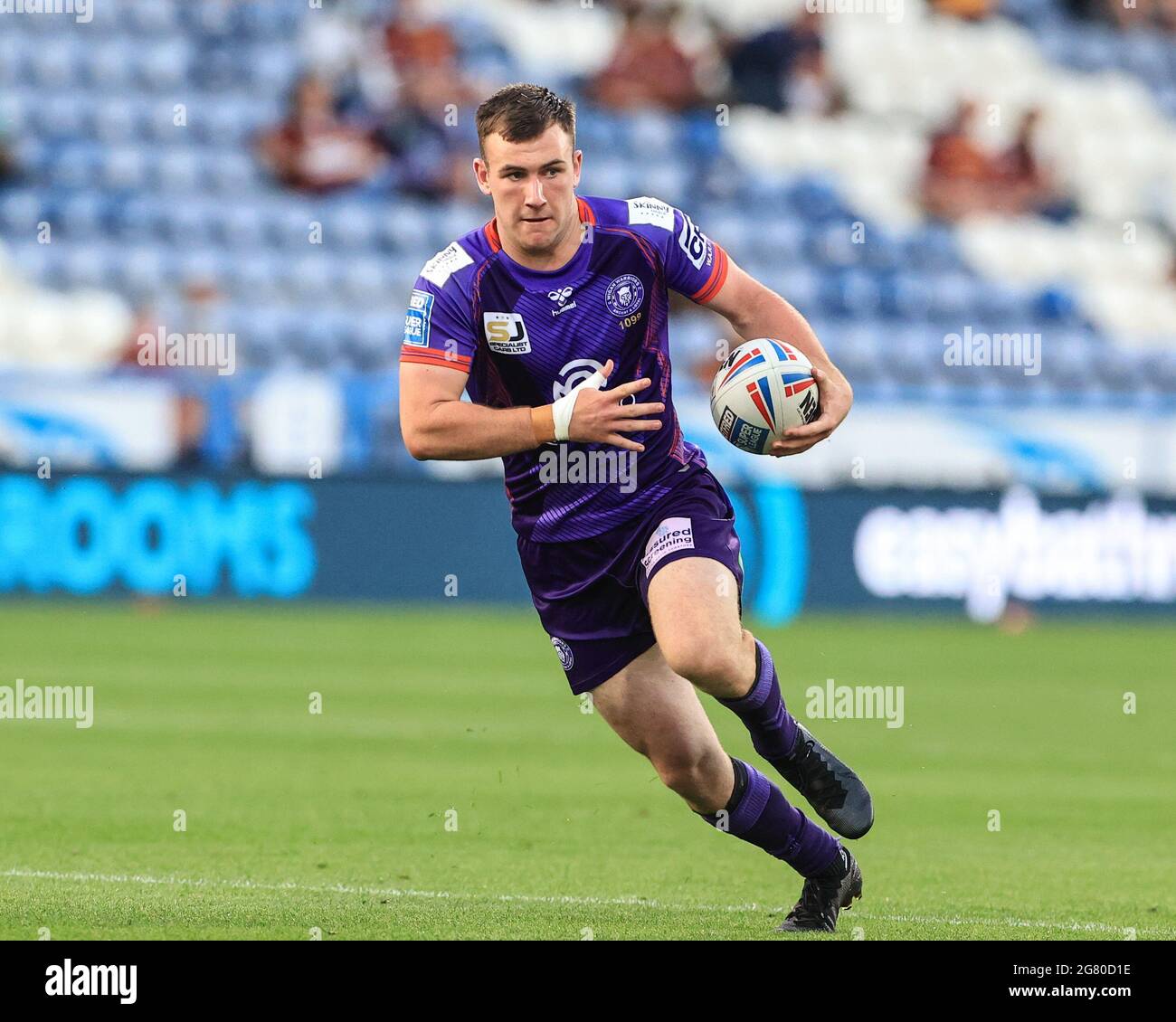 Harry Smith (20) of Wigan Warriors in action during the game Stock ...