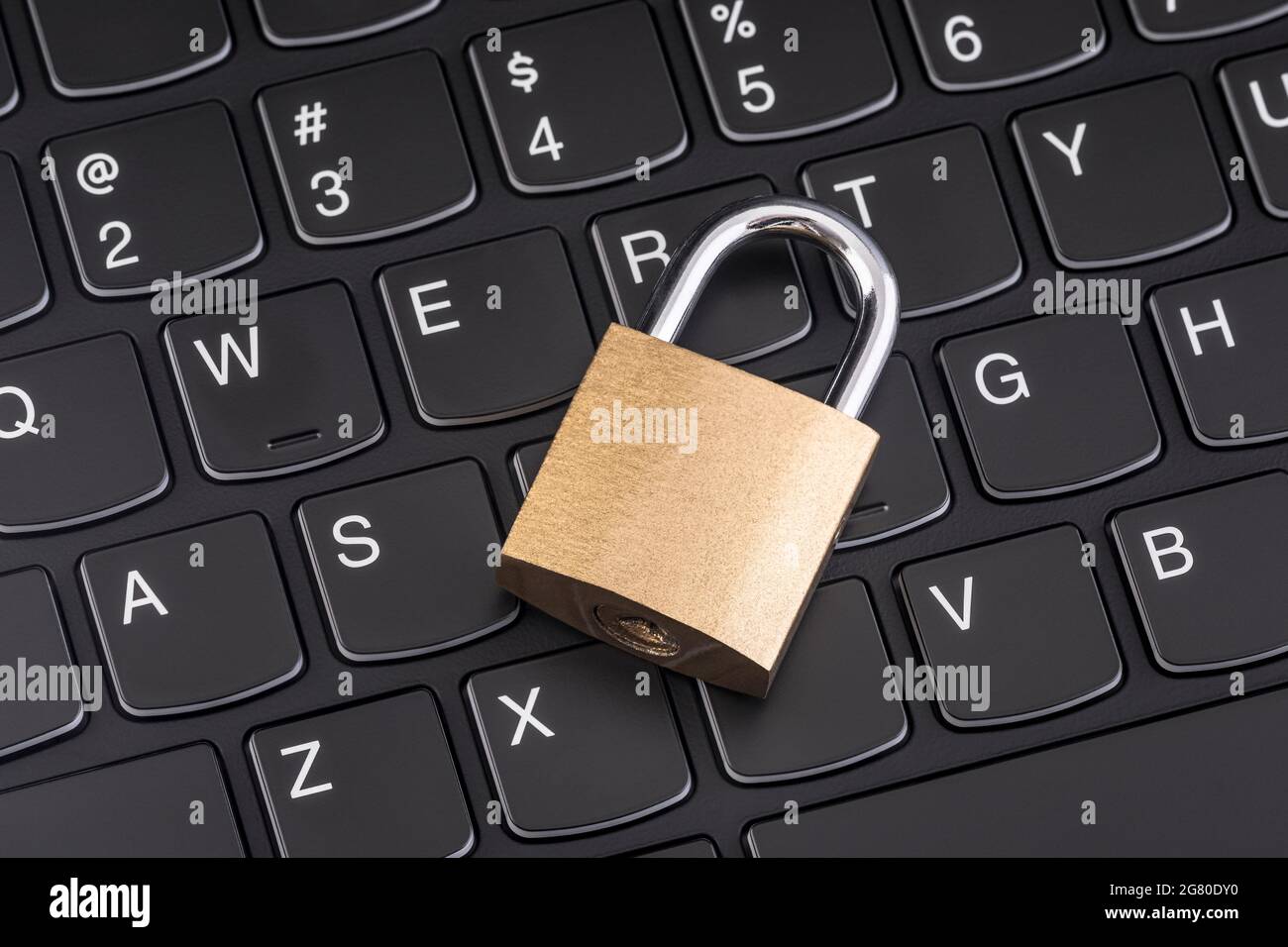 Computer security concept. Padlock on black laptop keyboard Stock Photo ...