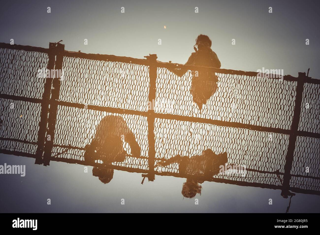 reflection silhouettes of people in the river Stock Photo - Alamy