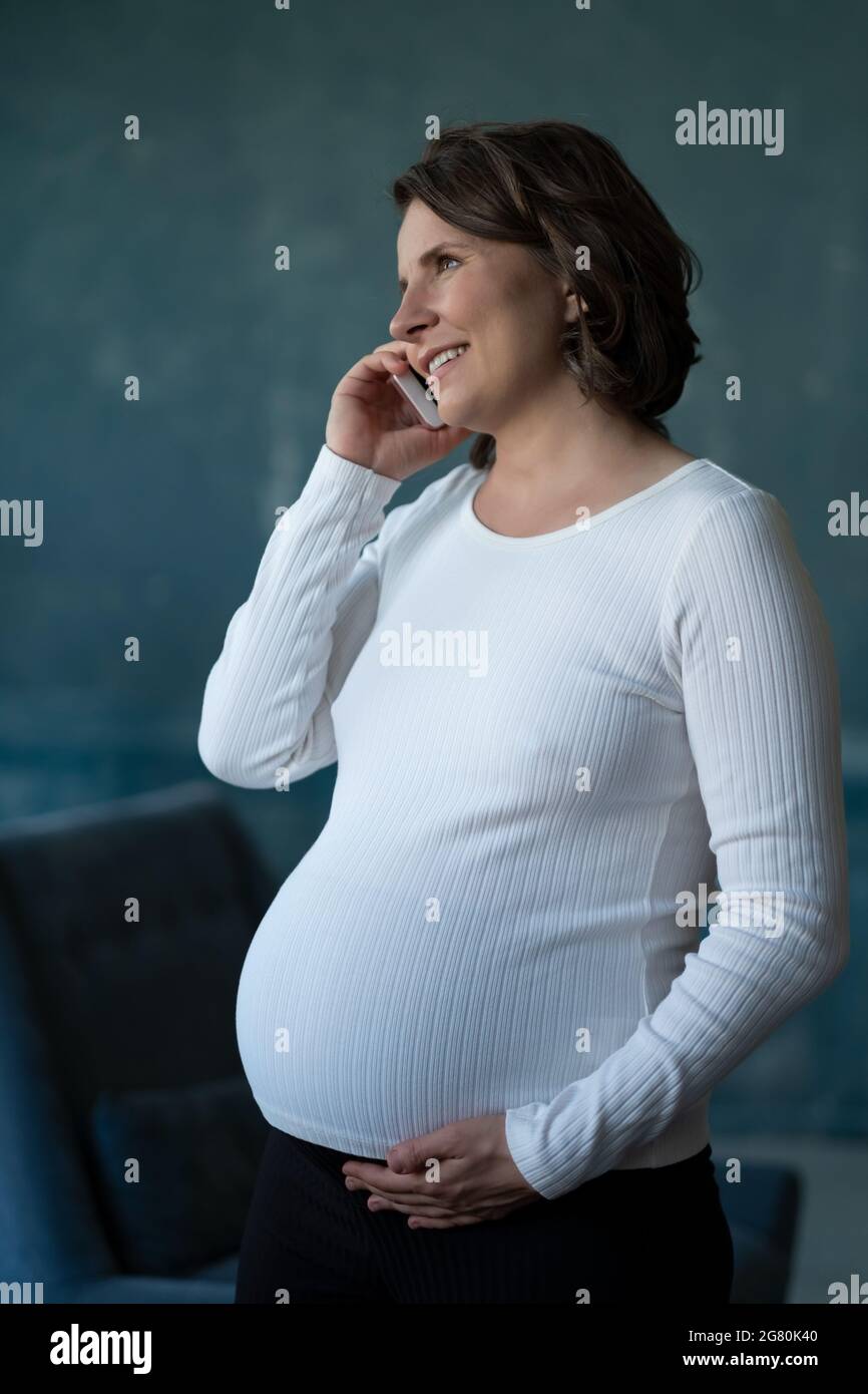 Child listening belly pregnant woman hi-res stock photography and ...