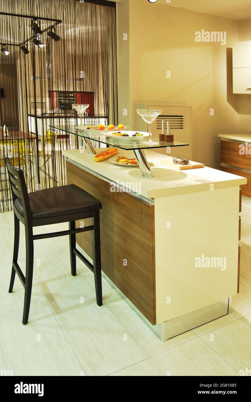 Interior of luxurious modern kitchen equipment, white and walnut ...