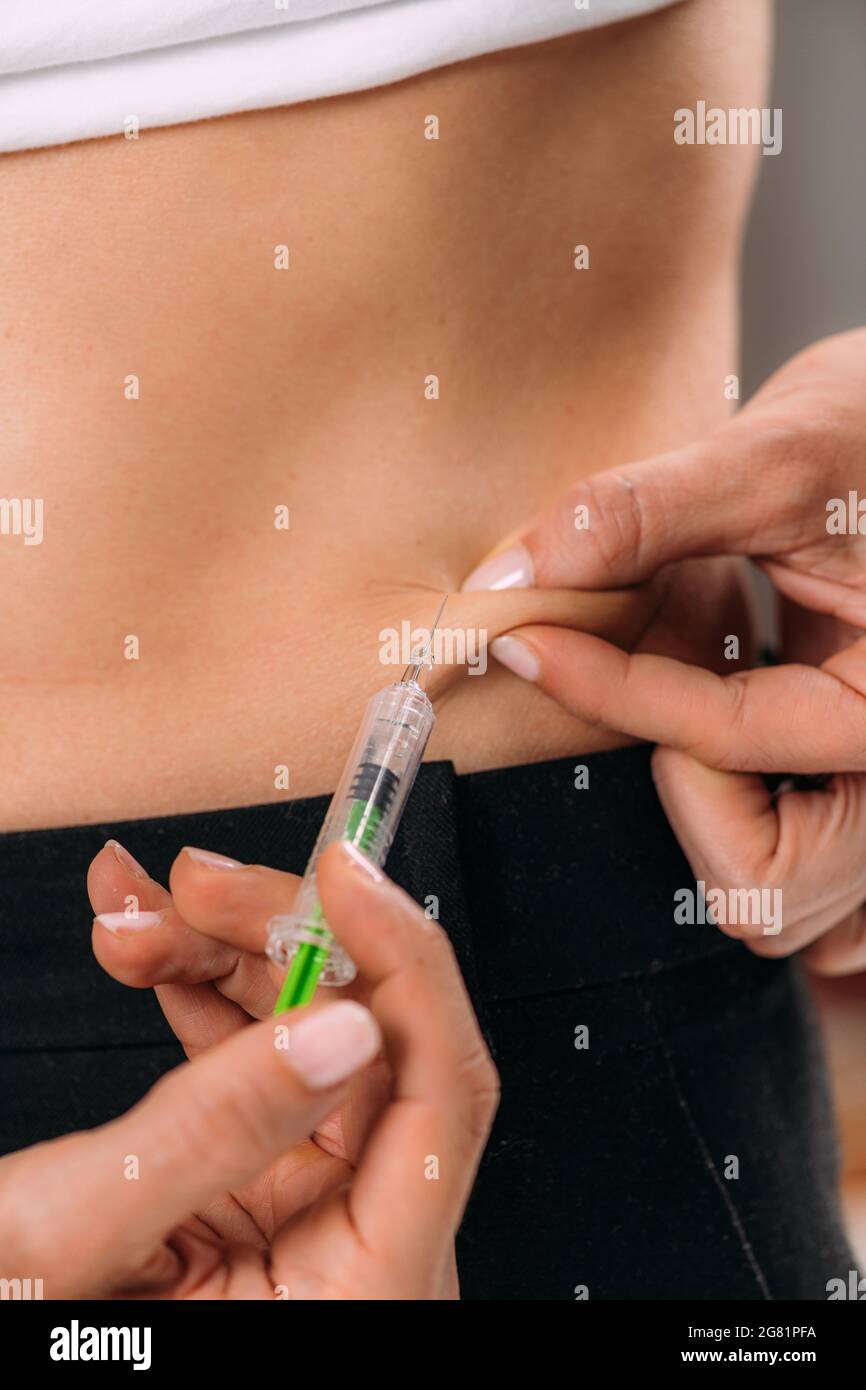 Self-injection of anticoagulant Stock Photo - Alamy