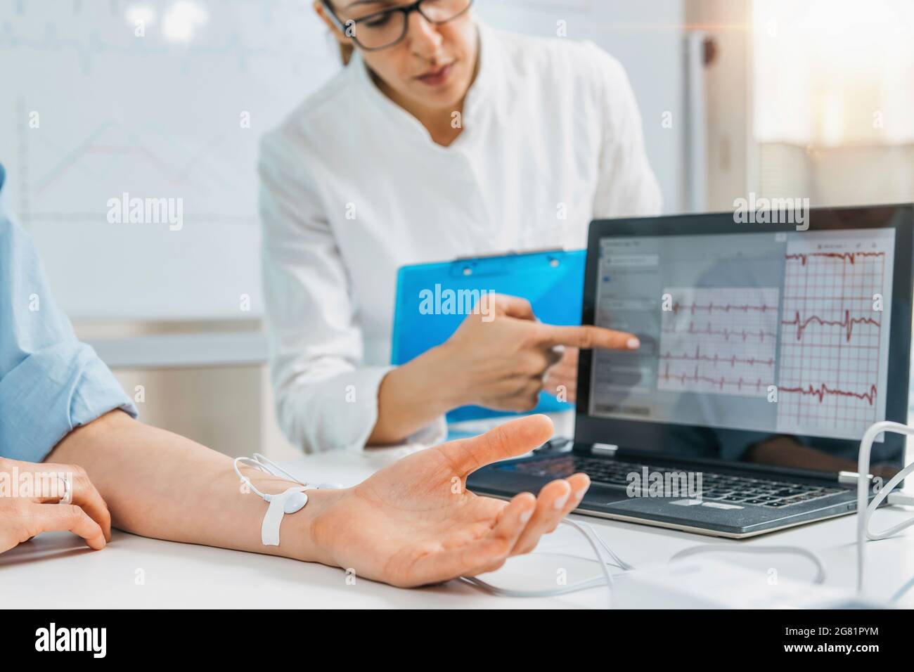 Hand with sensors for heart rate measurement Stock Photo - Alamy