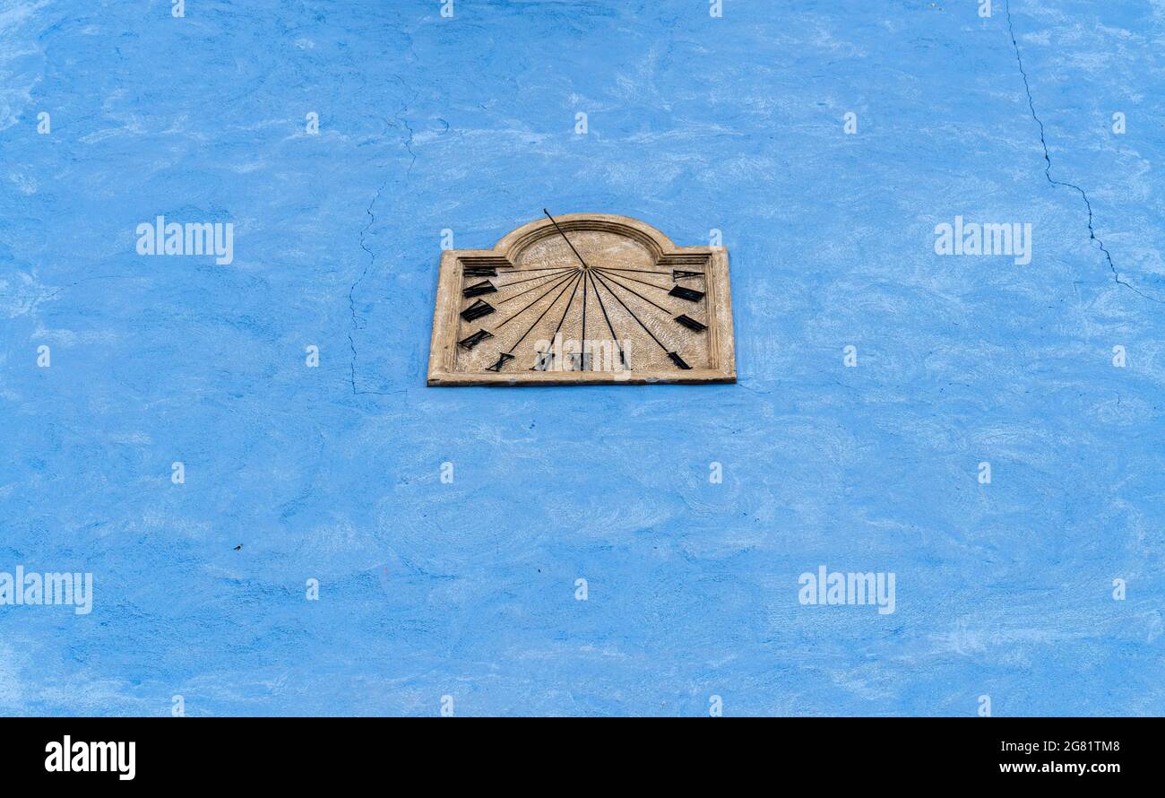 Old stone clock on a building wall Stock Photo - Alamy