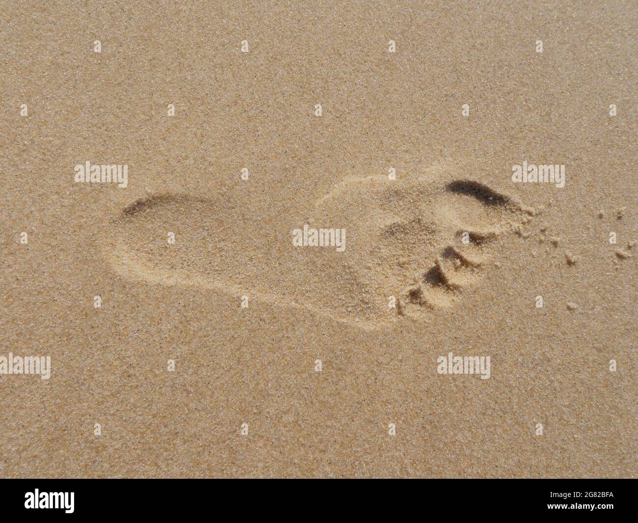 Top view of a footprint on the sand Stock Photo - Alamy