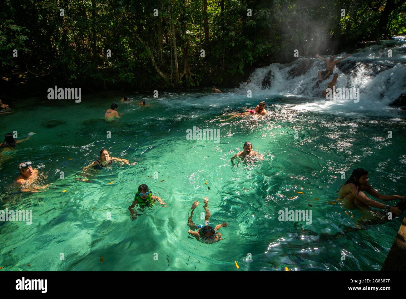 Tourists swimming at Cachoeira da Formiga, Jalapão, Tocantins, Brazil ...
