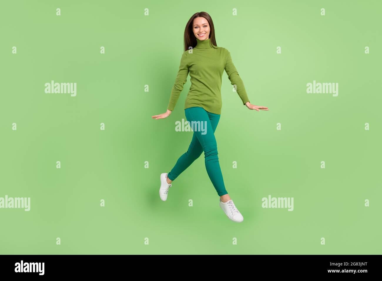 Full length body size photo woman jumping up stepping forward smiling ...