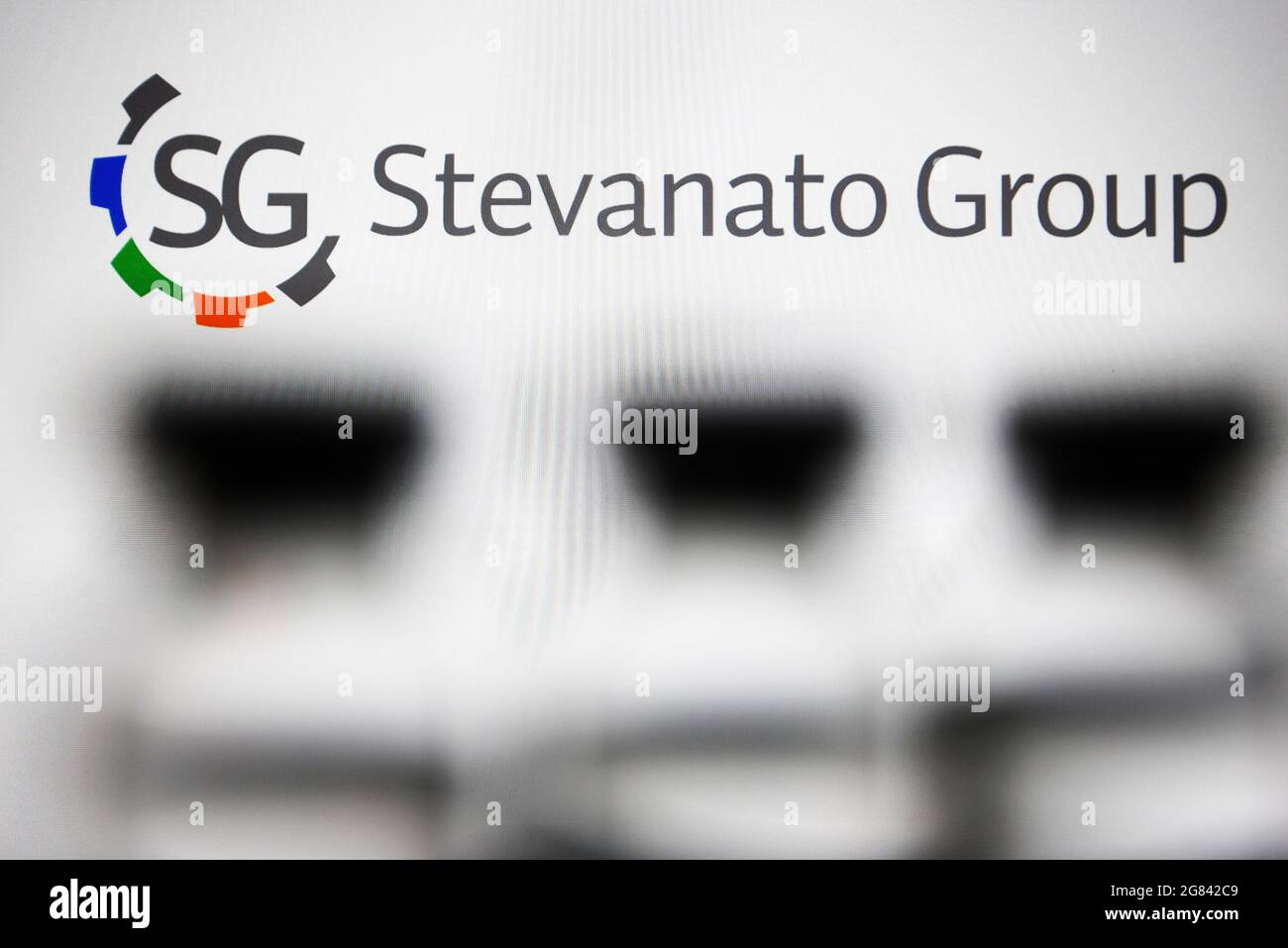 In this photo illustration, vials are seen and Stevanato Group logo of ...