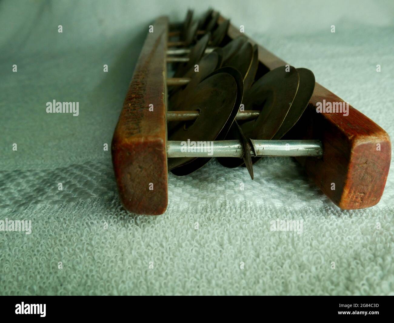 Musical religious instrument brass and wooden presented at white ...