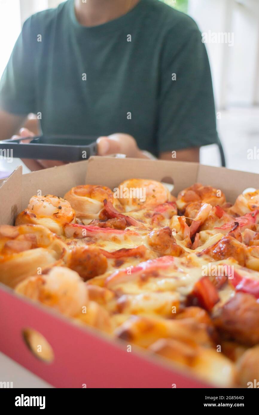 Pizza fast food in the office, stock photo Stock Photo - Alamy