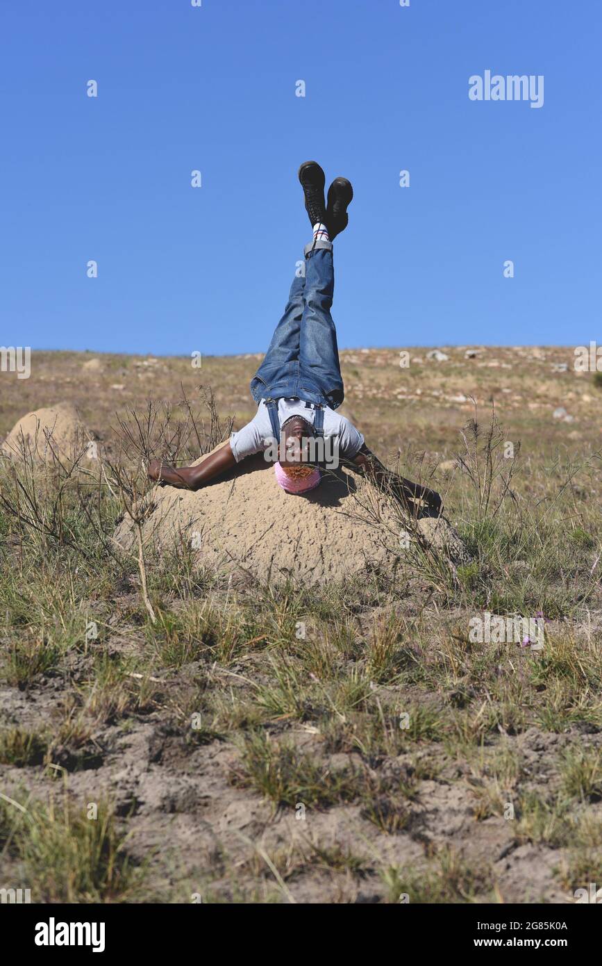 Portrait of young man laying on his back while looking at camera Stock ...