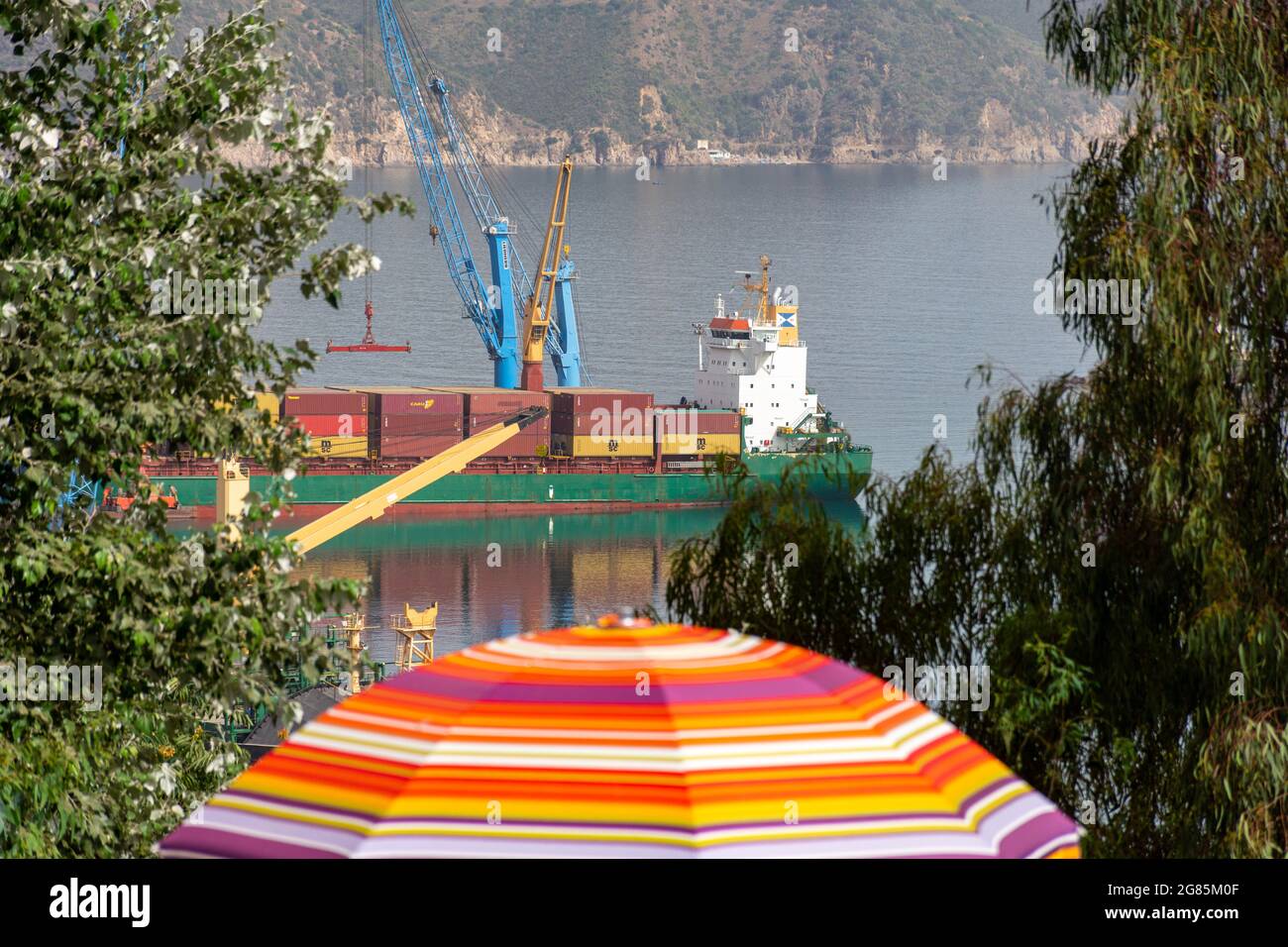 Colorful parasol on the hotel terrace Stock Photo - Alamy