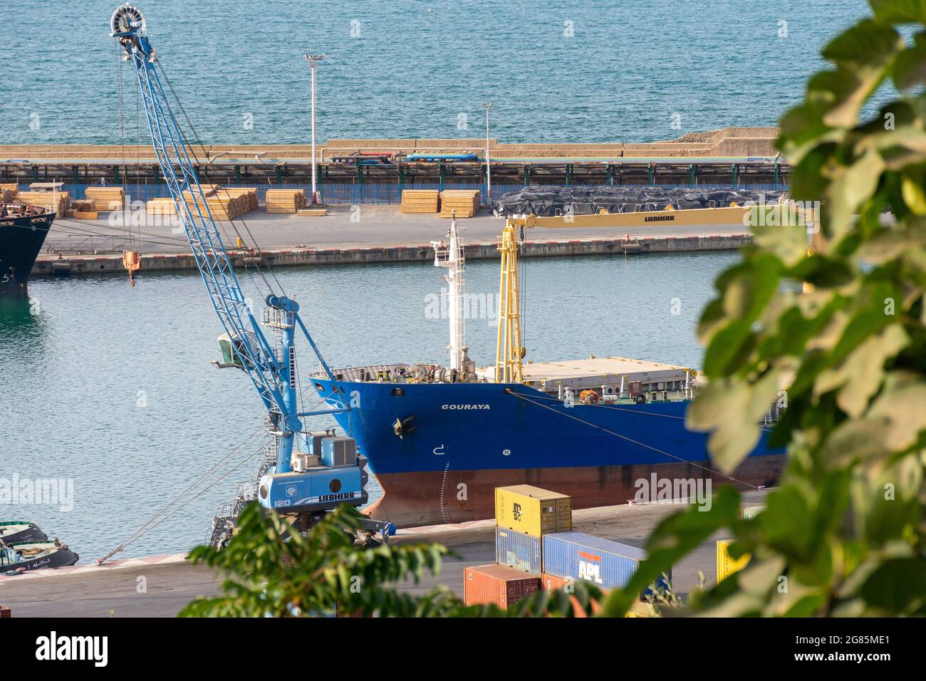 High-angle view of Skikda Port, shipping containers, oil tanker ship ...