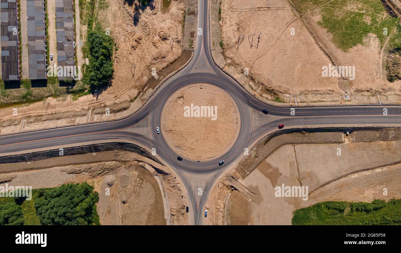 Top down aerial view of a new traffic roundabout. Roundabout traffic of ...