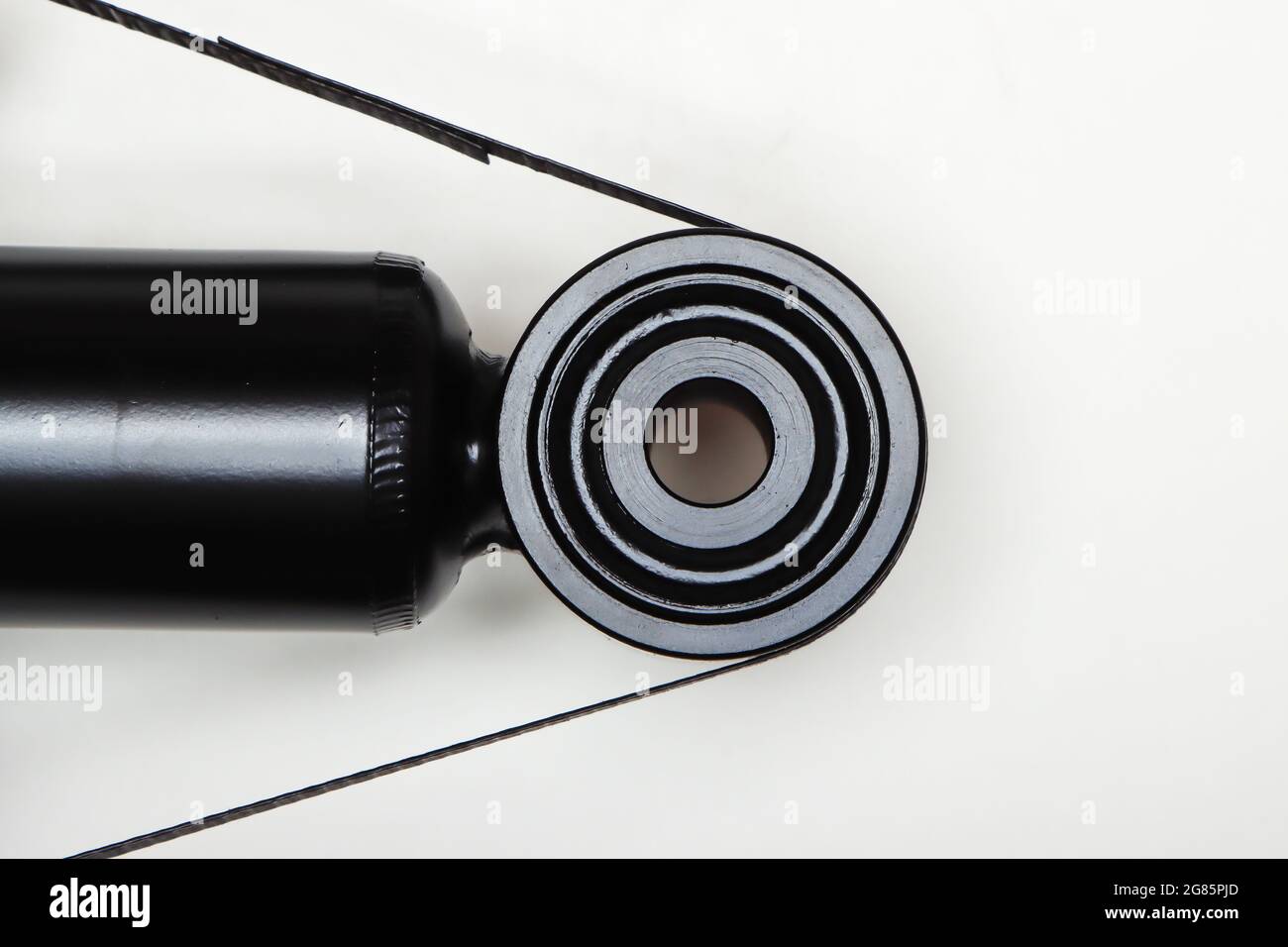 The shock absorber mounting eye for the machine is on a flat surface ...