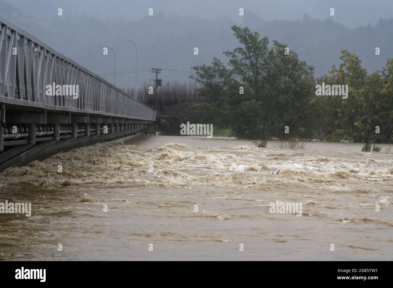 MOTUEKA RIVER FLOWING UNDER MOTUEKA RIVER BRIDGE. Motueka, New Zealand ...
