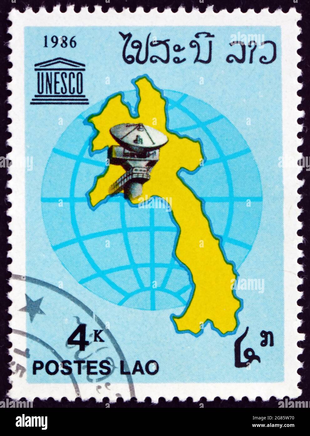 LAOS - CIRCA 1986: a stamp printed in Laos shows satellite dish, map ...