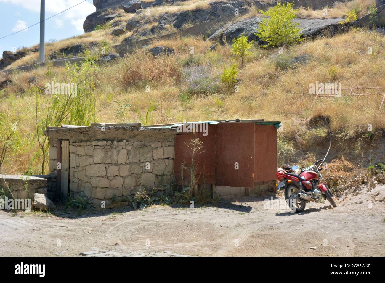 A motorcycle stopped by the road Stock Photo - Alamy