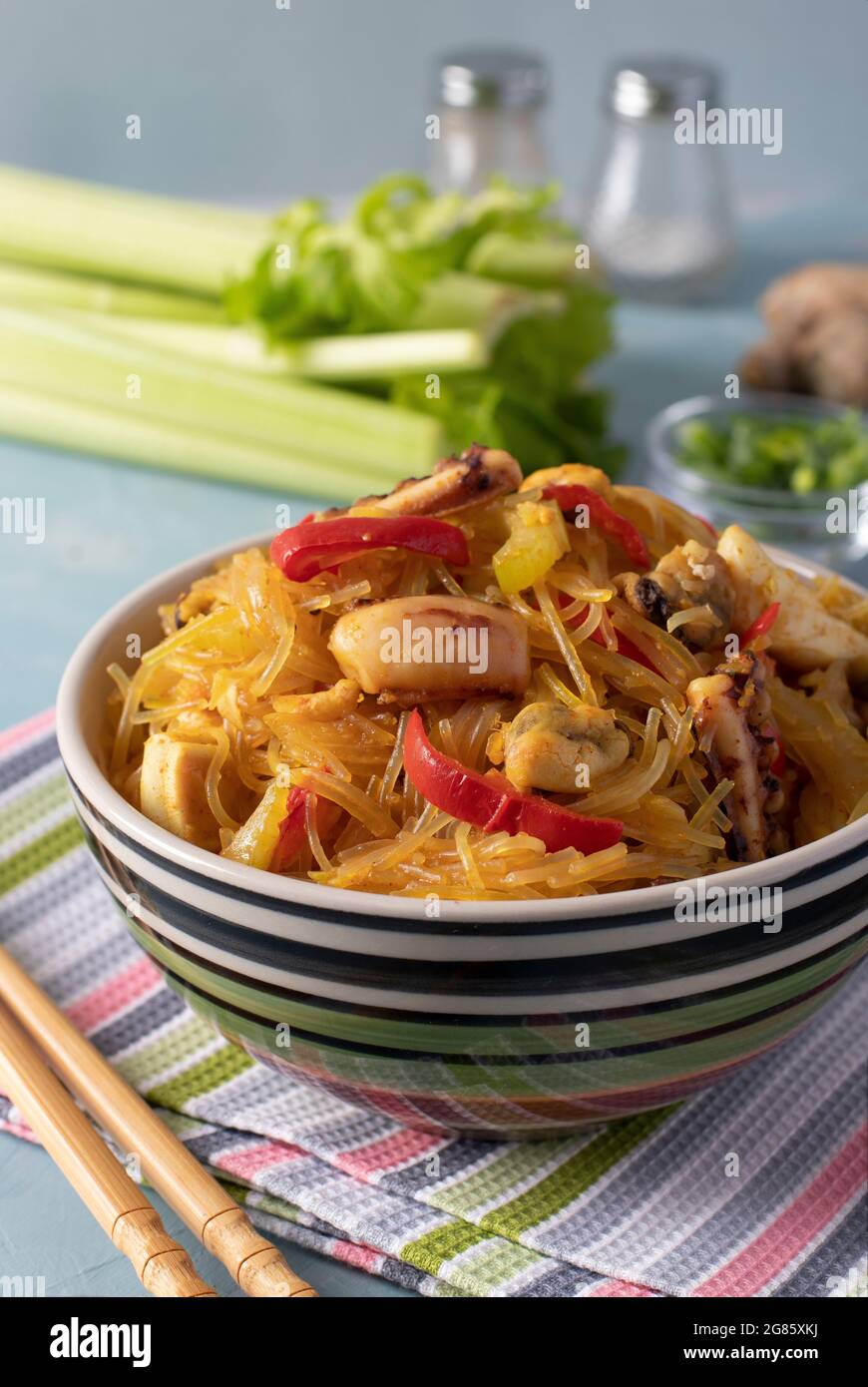 Rice noodles Funchoza with seafood. Cellophane pasta, mussels, squid ...