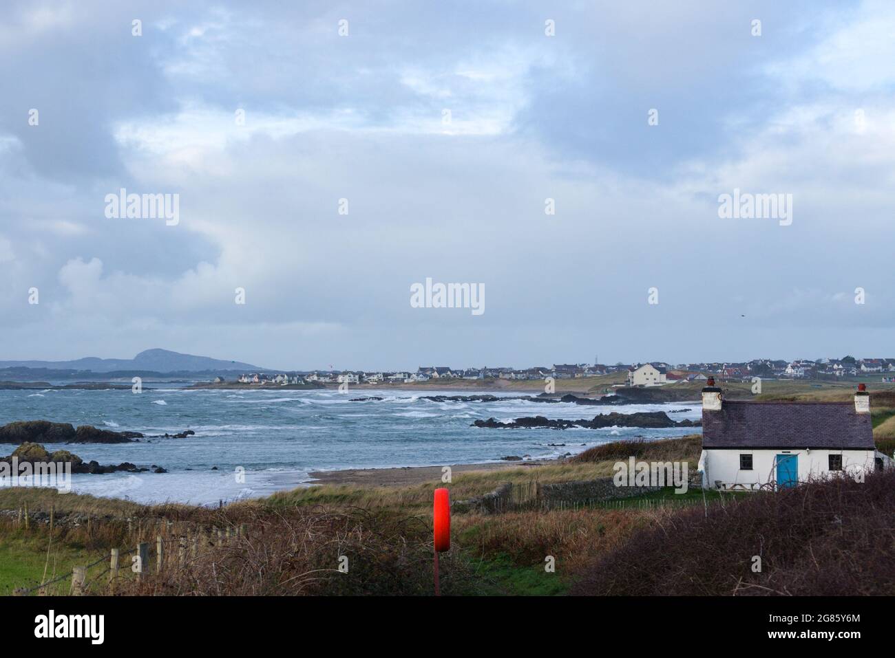 Country cottage, Anglesey, Wales. Landscape with view to sea on a ...