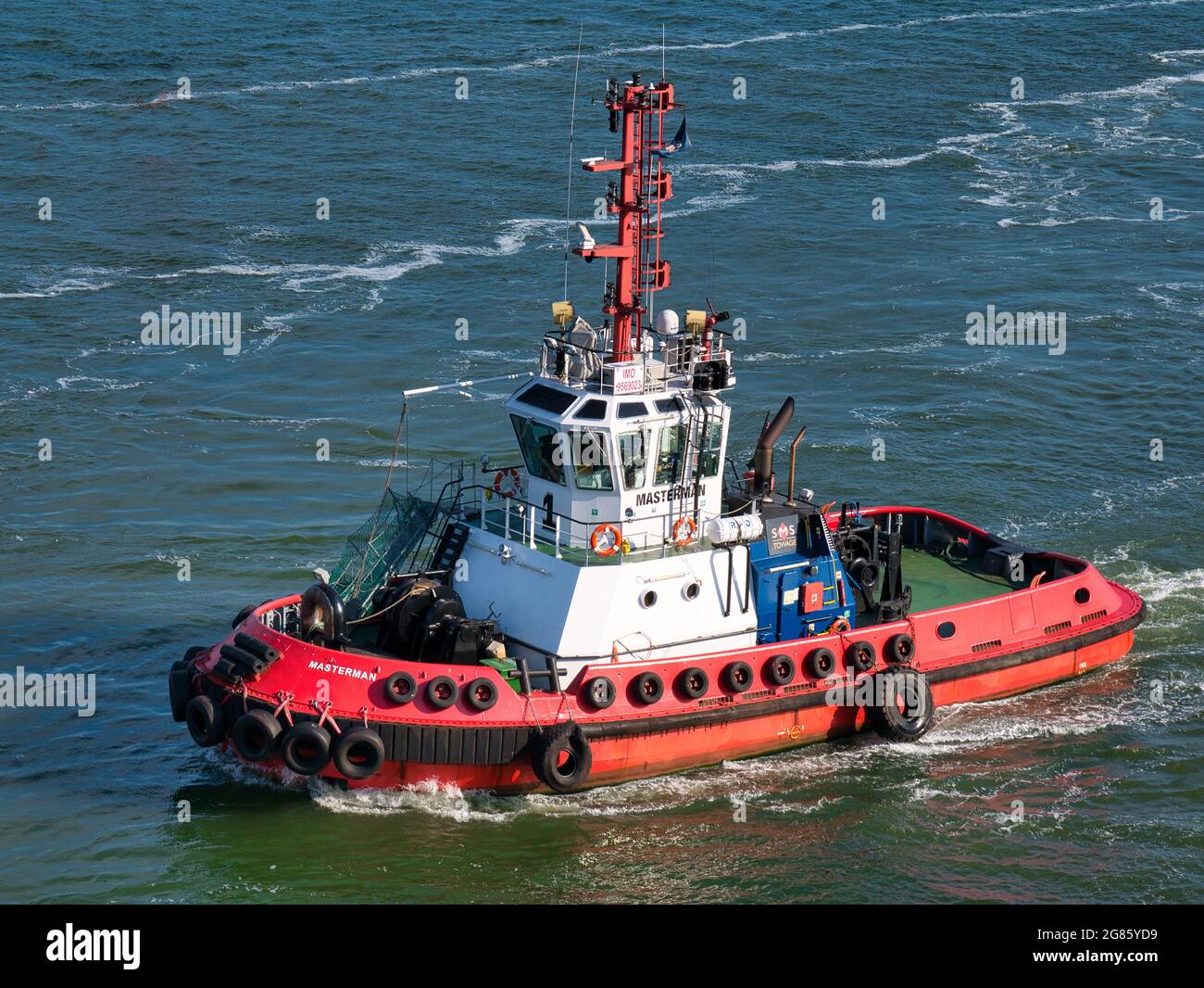 Industrial tugboat sails on calm hi-res stock photography and images ...