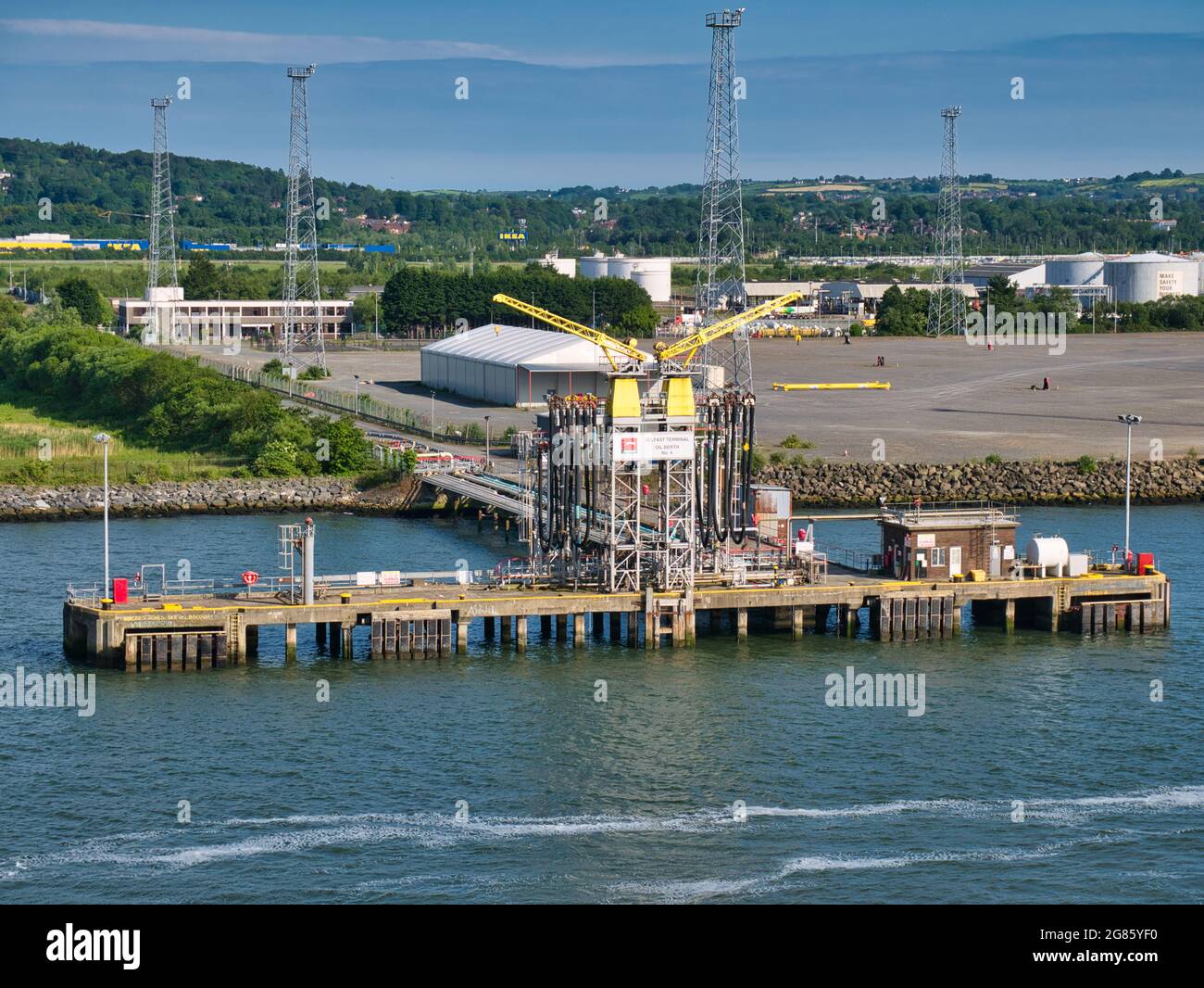 The Belfast Oil Terminal on a clear and sunny evening in June 2021 ...
