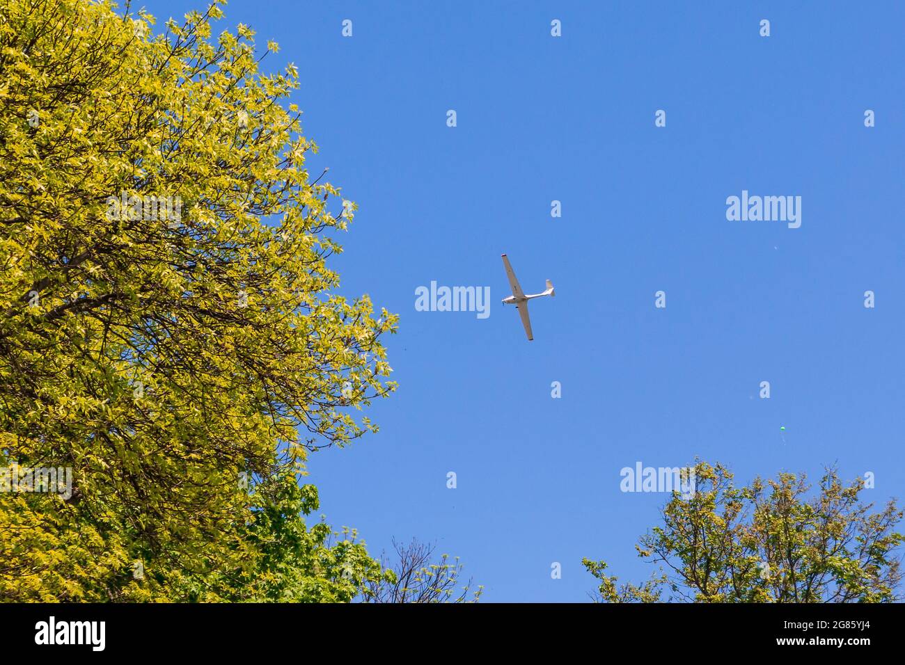 a plane in the summer sky Stock Photo - Alamy